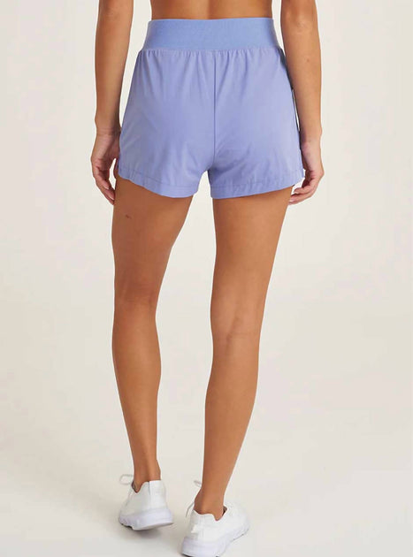 THRIVE SOCIETE Angled Inset Running Shorts In Wild Indigo | ShopSimon