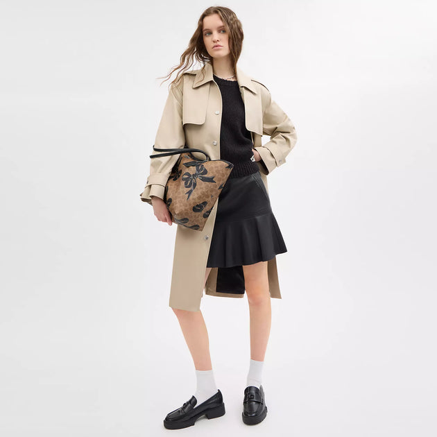 Coach Outlet City Tote Bag In Signature Canvas With Bow Print | ShopSimon