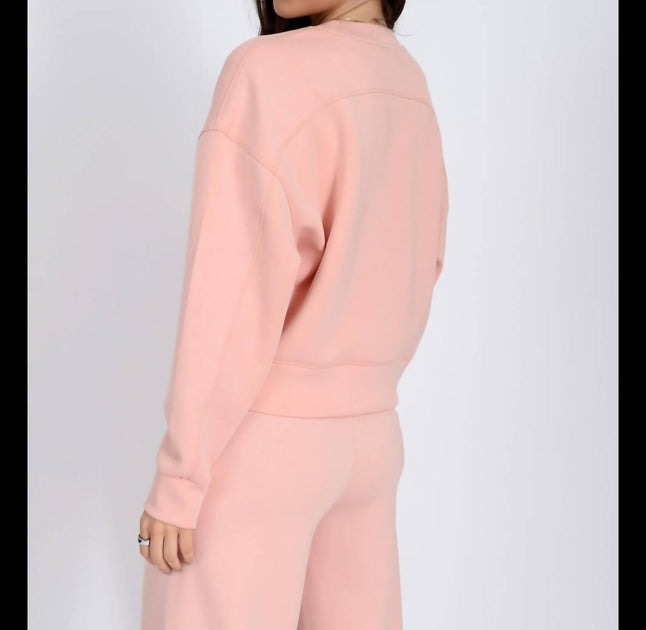 RD International Lucie Crewneck Sweater In Dusty Peach | ShopSimon