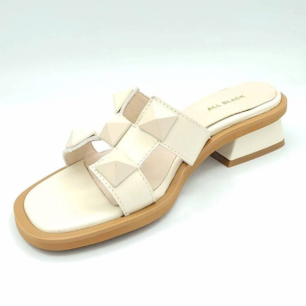 ALL BLACK Women's Pyramid Stud Mule In White | ShopSimon