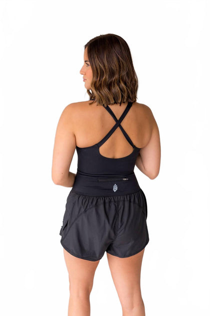 Free People Righteous Reflective Logo Runsie Romper In Black Combo ...